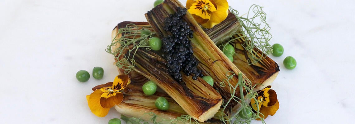 Braised, Charred Leeks with Peas and Caviar | Gordon Food Service